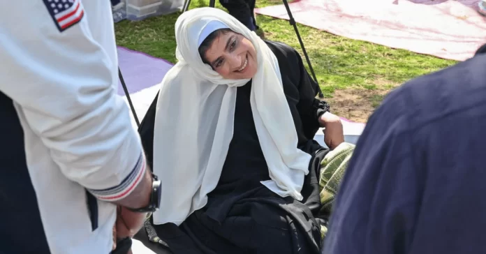 Moza Bin Zeban: Emirati artist with paralyzed hands creates art with ...